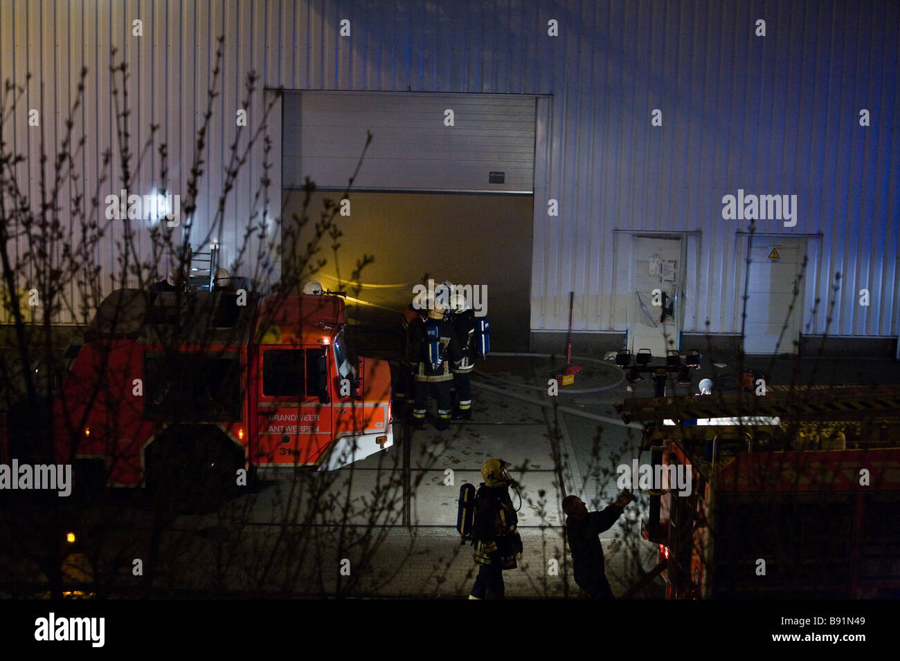Firefighters at work Stock Photo - Alamy
