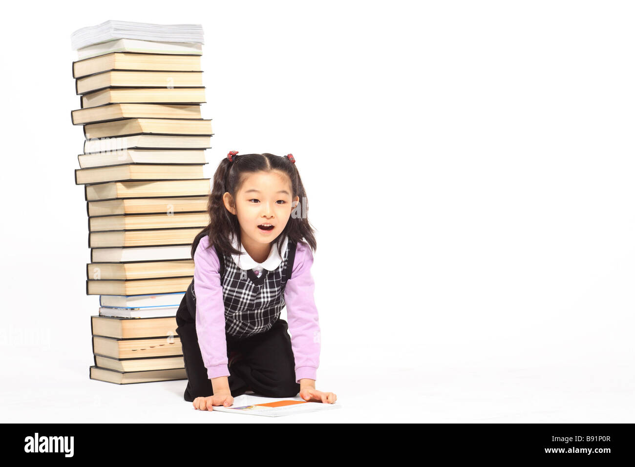 Young Child in Study Stock Photo - Alamy