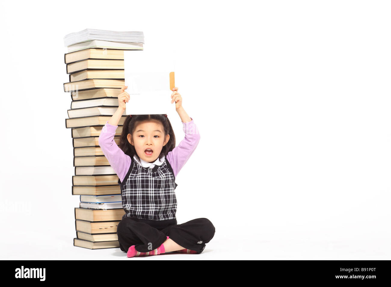 Young Child in Study Stock Photo - Alamy