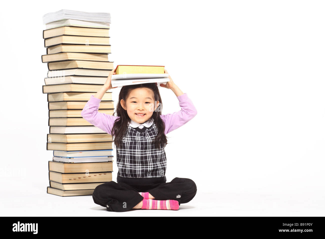 Young Child in Study Stock Photo - Alamy