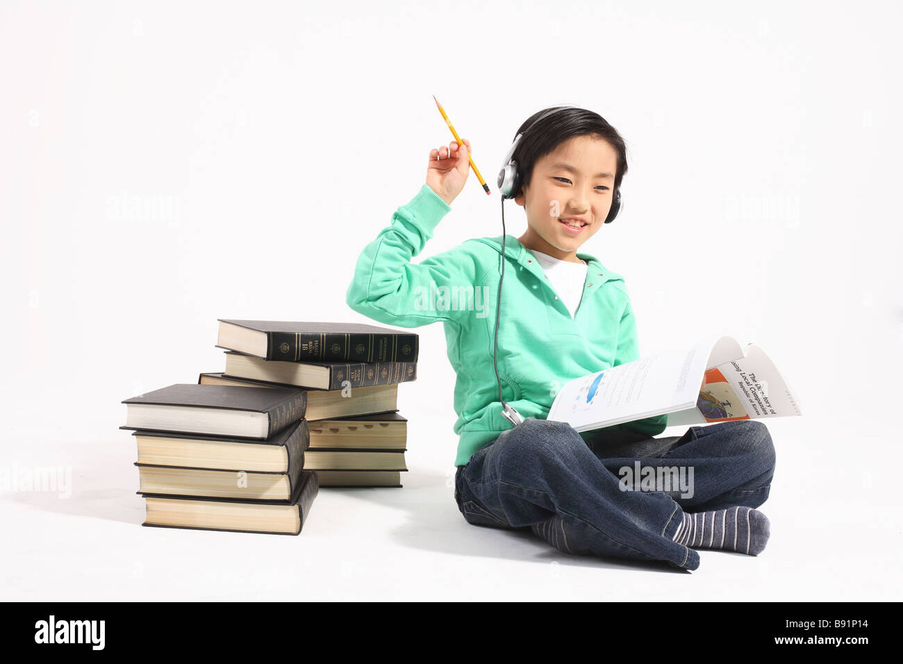 Young Child in Study Stock Photo - Alamy