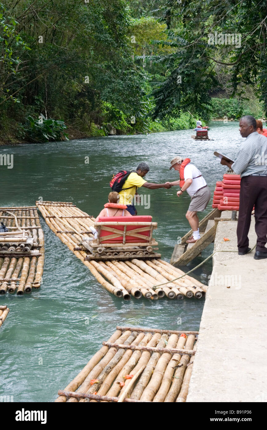 Jamaican river rafts and tourists Stock Photo - Alamy