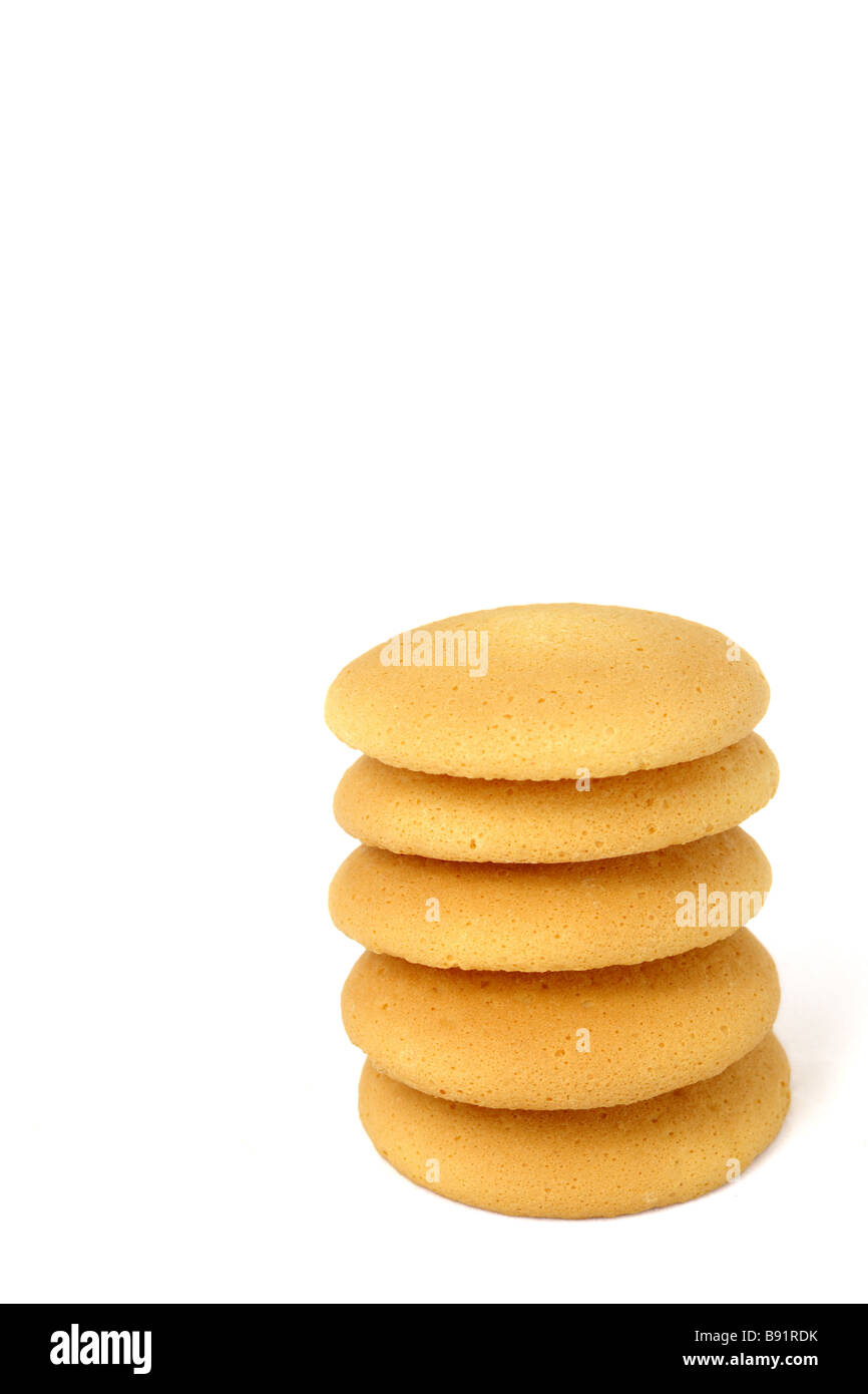 Pile of five biscuits on a white background Stock Photo - Alamy