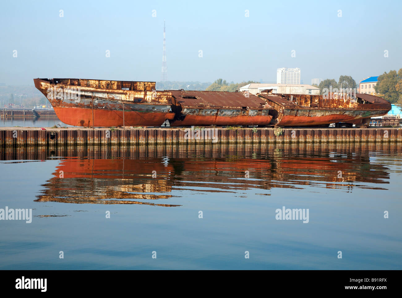 Destroyed (splitted on three part) ship on sea port jetty (Mariupolj ...