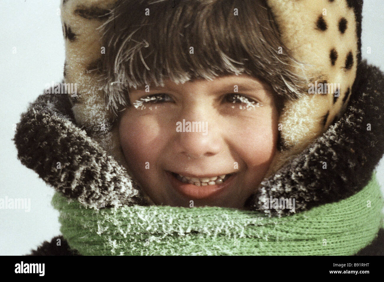 A little girl from Topoliny village out in the street in biting frost ...