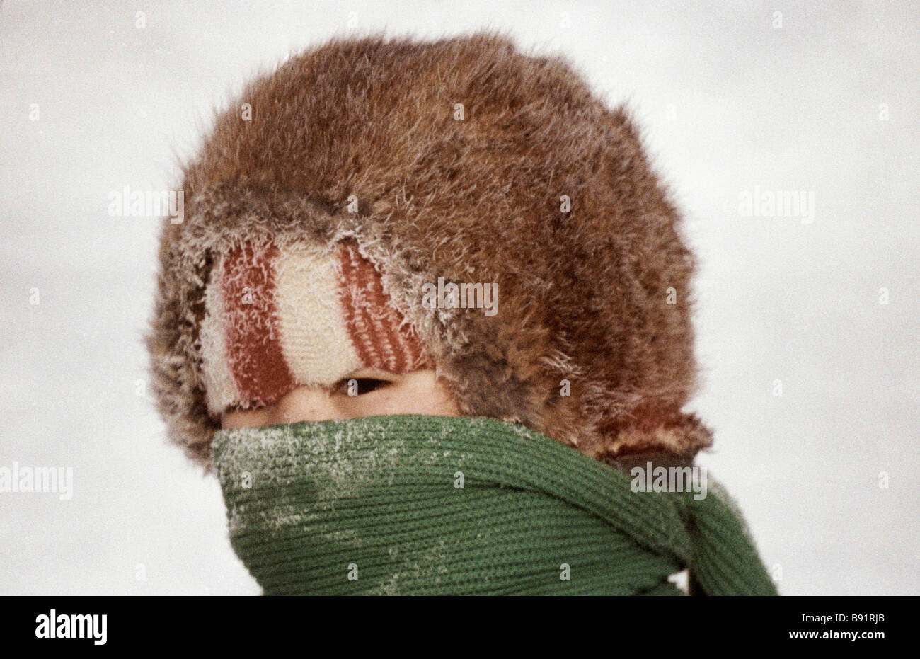 A little child outdoors in biting frost Stock Photo - Alamy