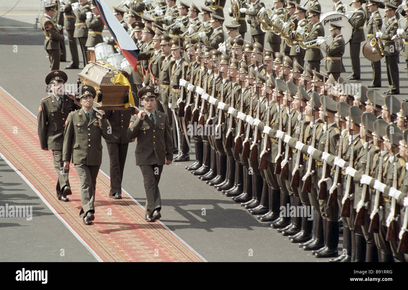 Military men carrying the coffin with remains of Emperor Nicholas II at ...