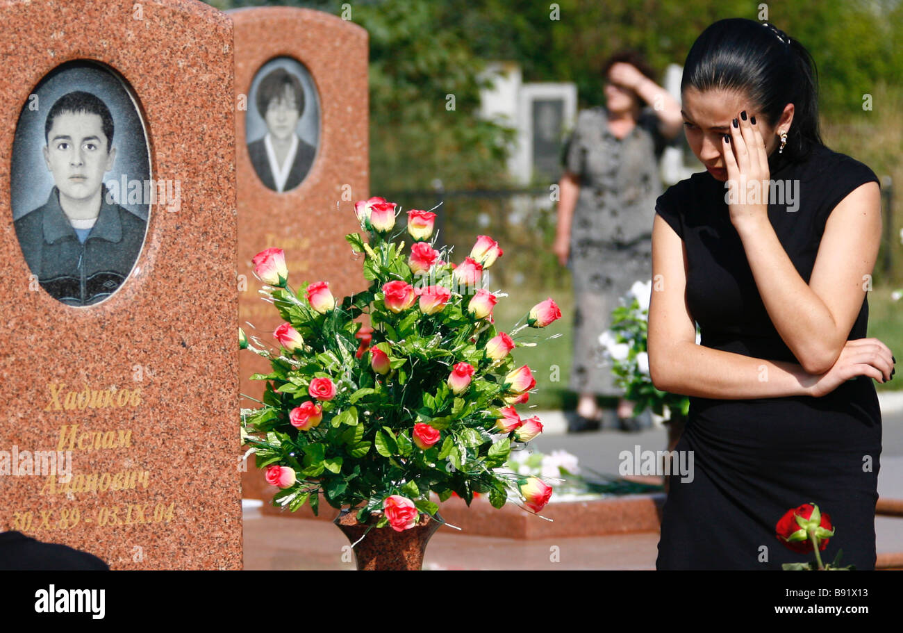 A memorial service held in Beslan for the 333 victims of the Beslan ...