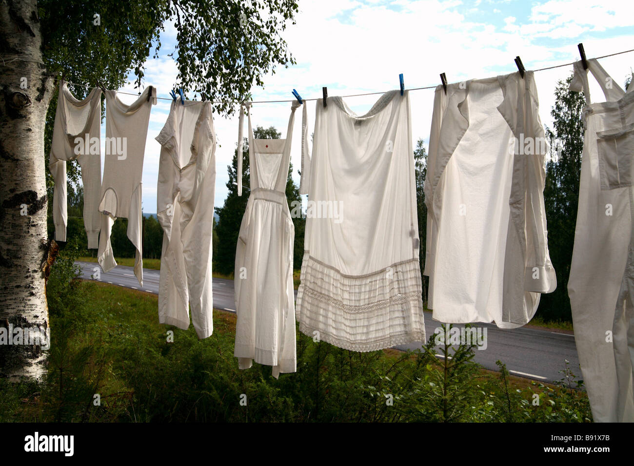 Clothes on clothes line Sweden Stock Photo - Alamy
