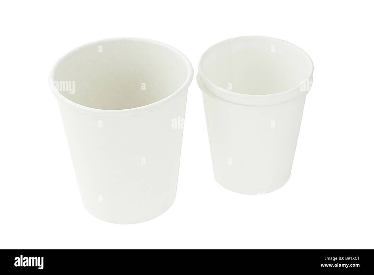 Disposal paper cups on white background Stock Photo - Alamy