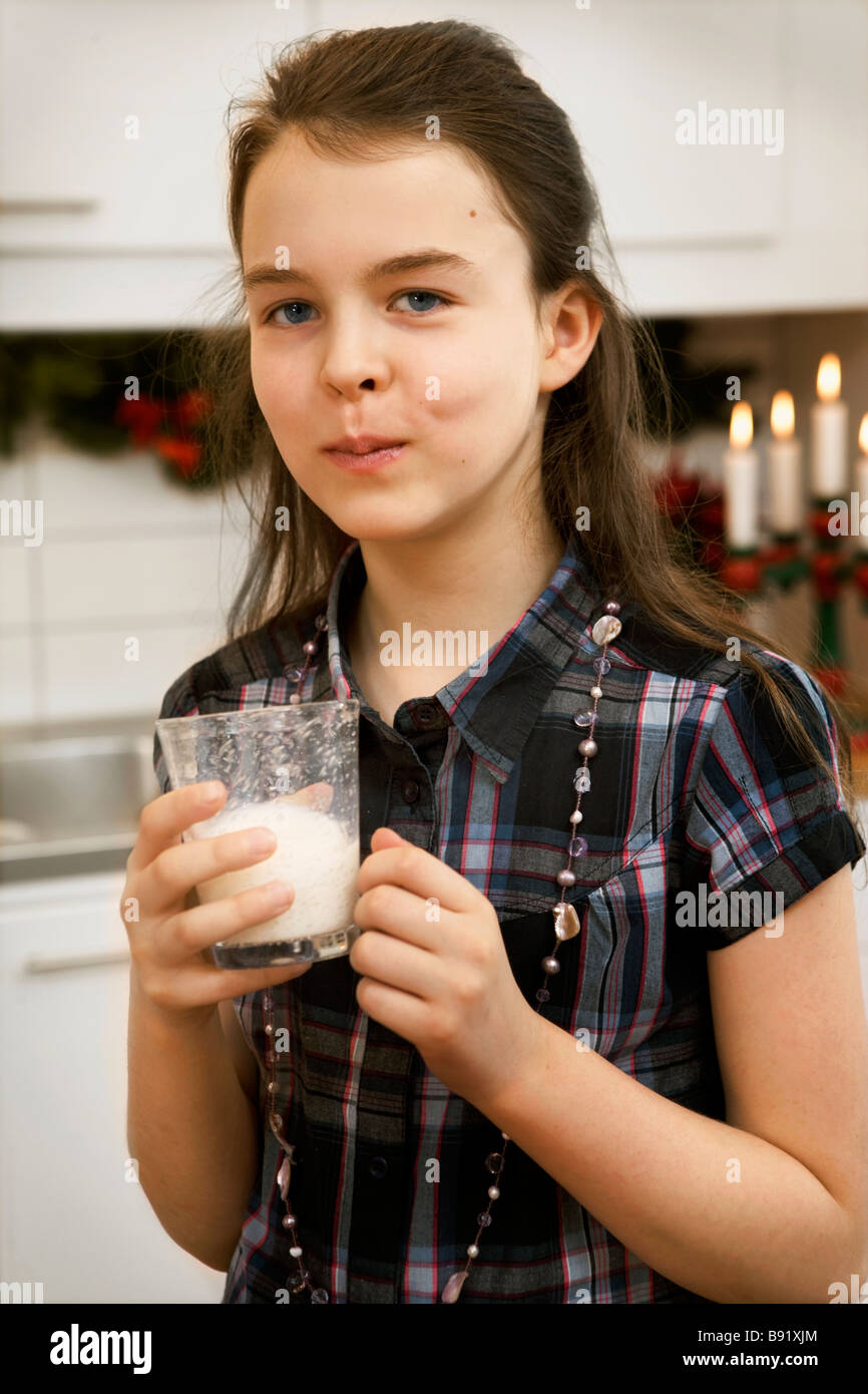 A girl drinking milk Stock Photo - Alamy