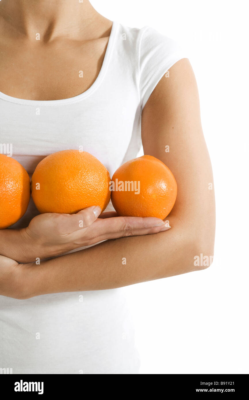 Three Young Women Eating Oranges High Resolution Stock Photography and ...