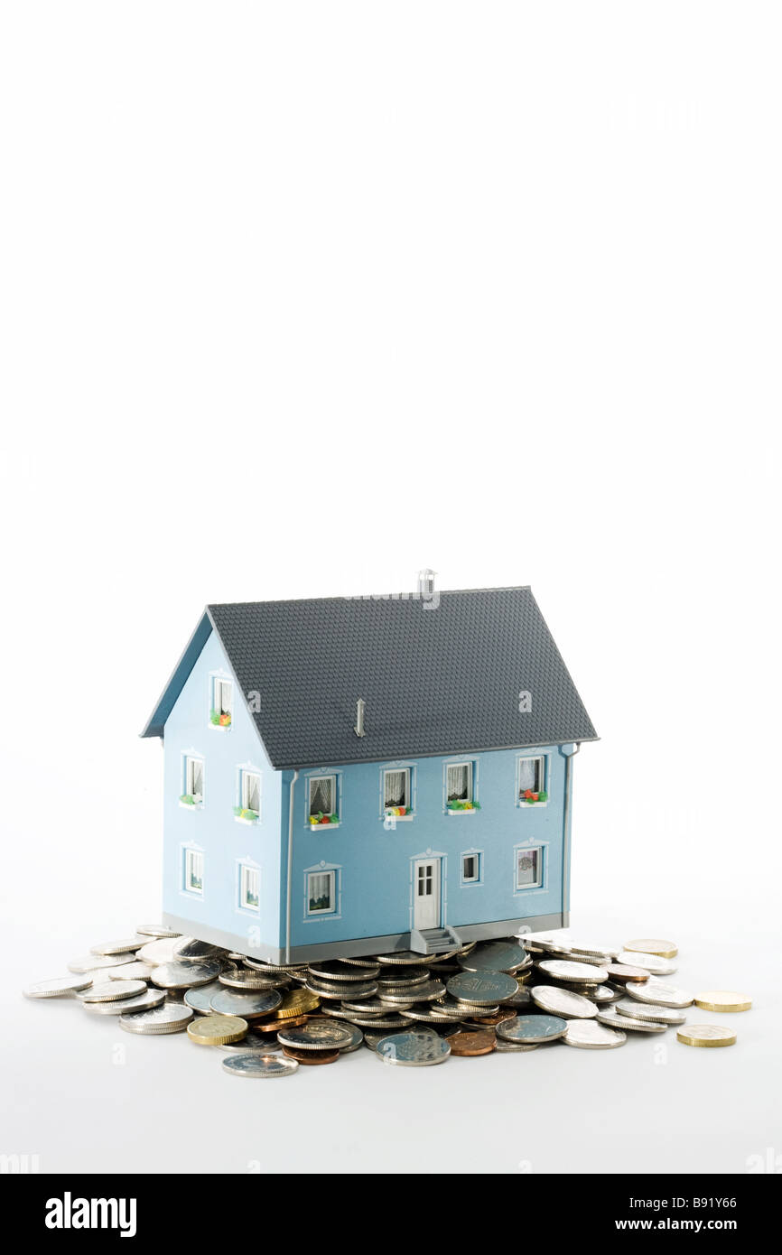Miniature house and euro coins hi-res stock photography and images - Alamy