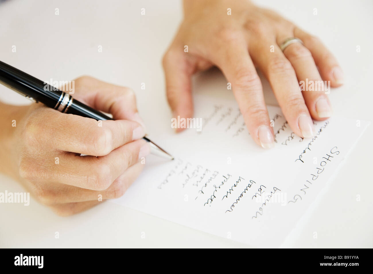 Woman Writing List Colour High Resolution Stock Photography and Images ...