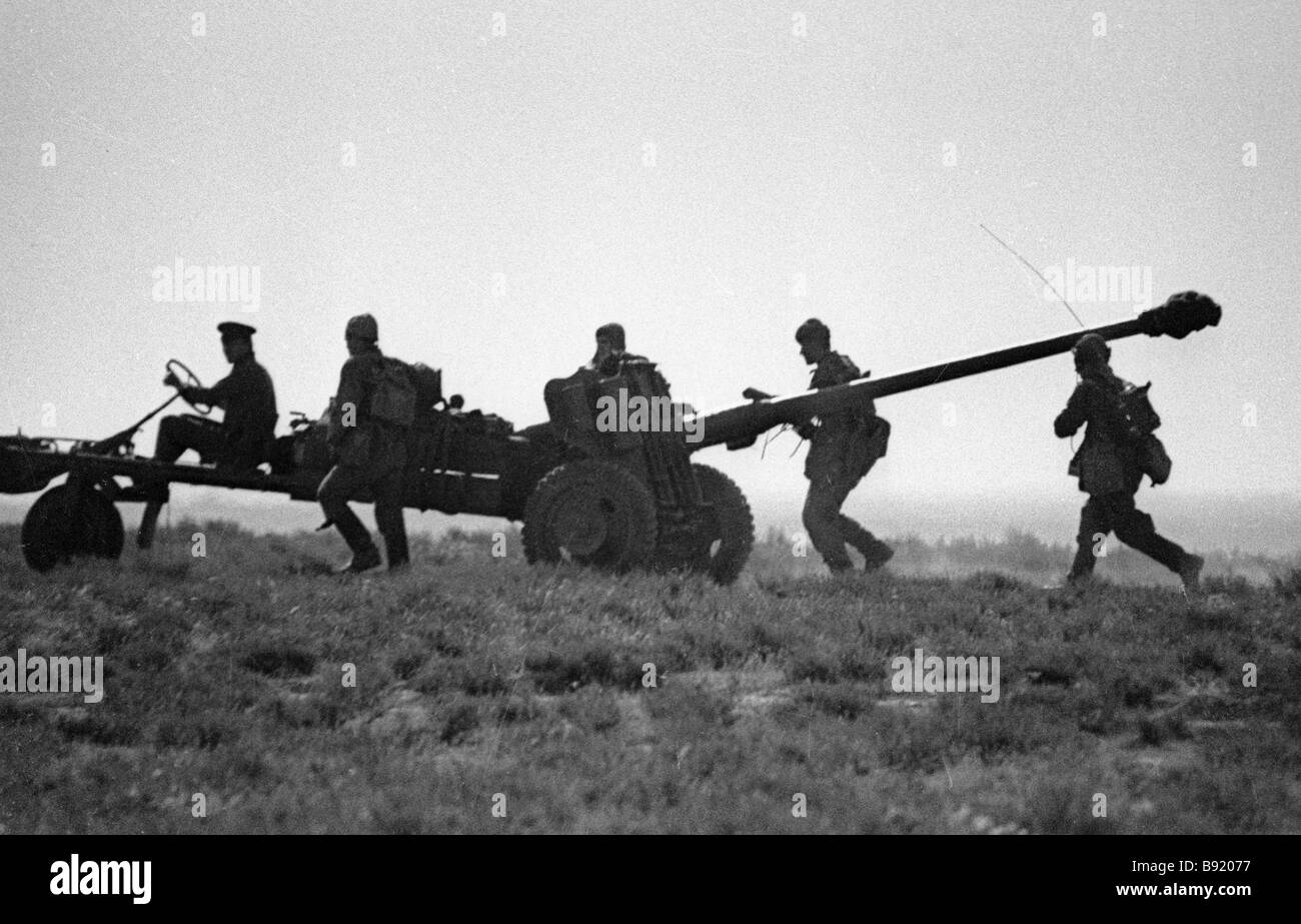 Line Of Artillery Guns Firing