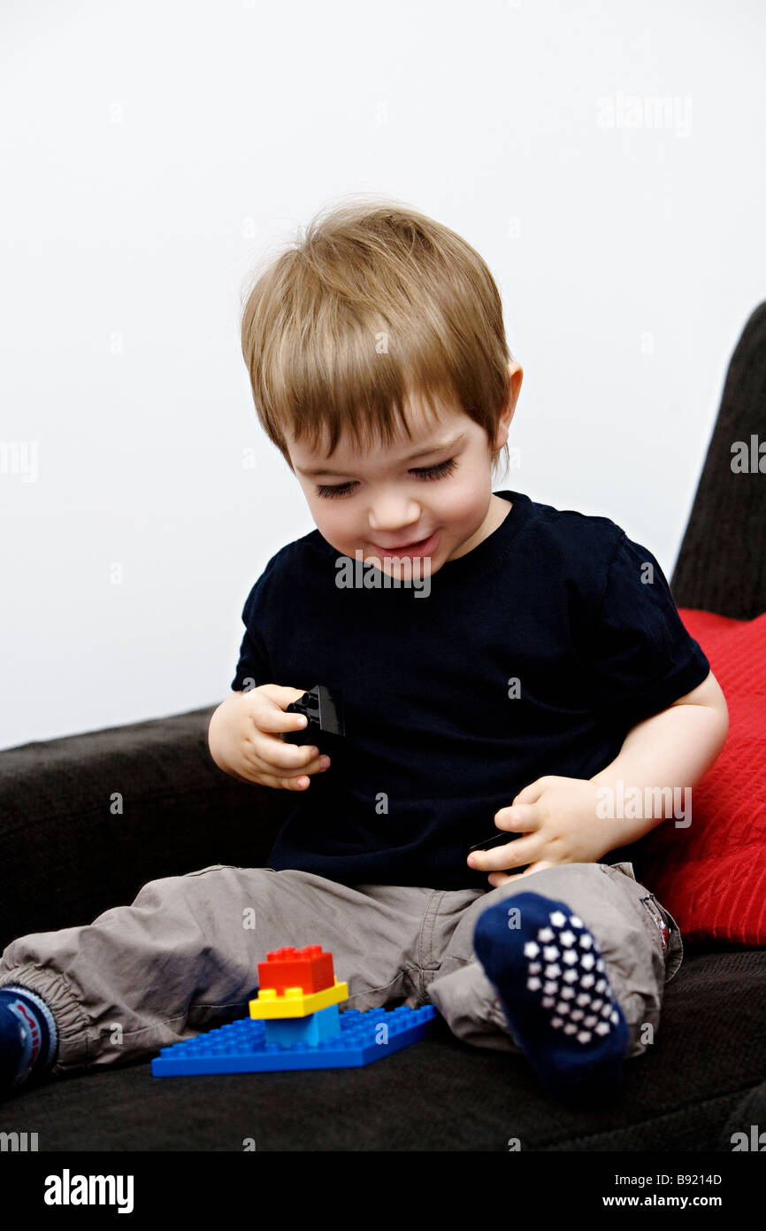 Boys playing lego hi-res stock photography and images - Alamy