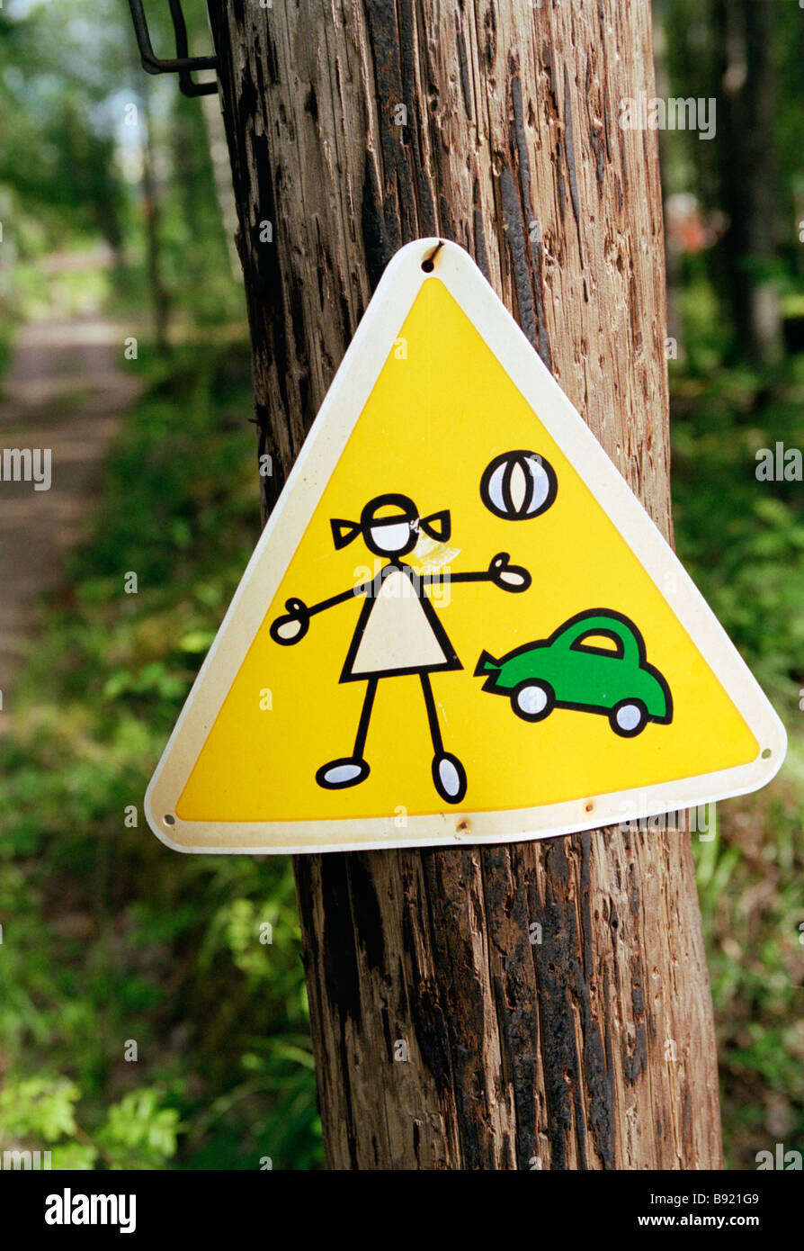 A sign warning for children Stock Photo - Alamy