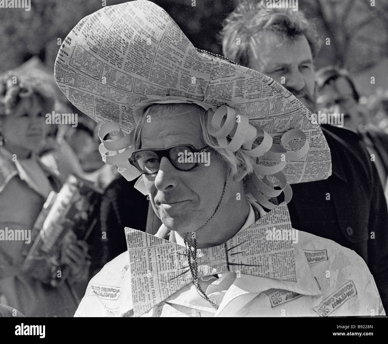 Journalist in a unique hat made of newspaper during Press Day Stock ...
