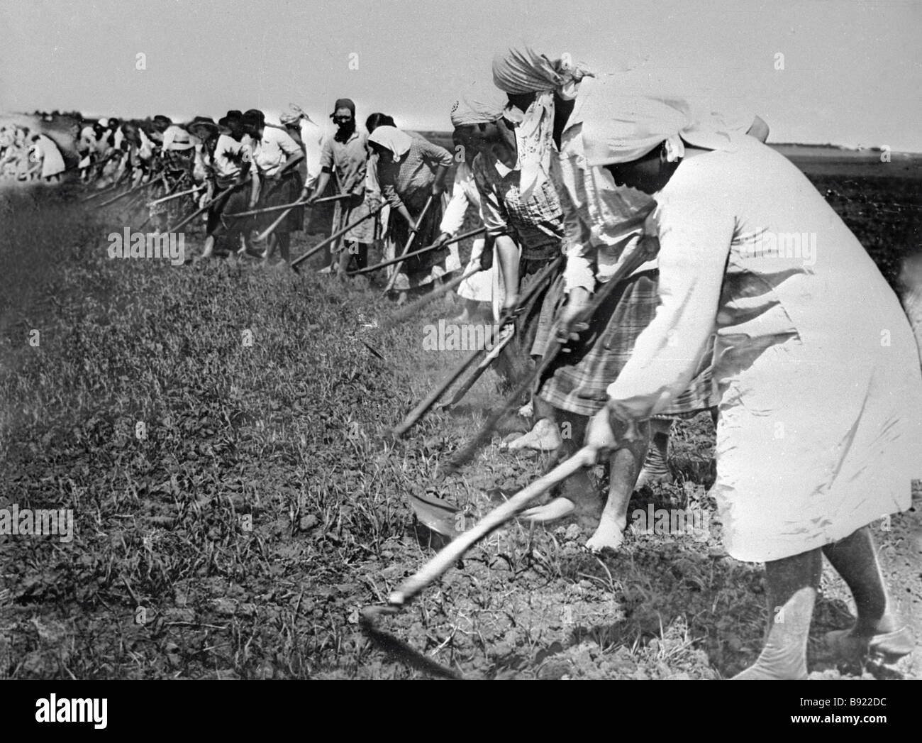 Workers at the Frunze mine working at a communist subbotnik together ...