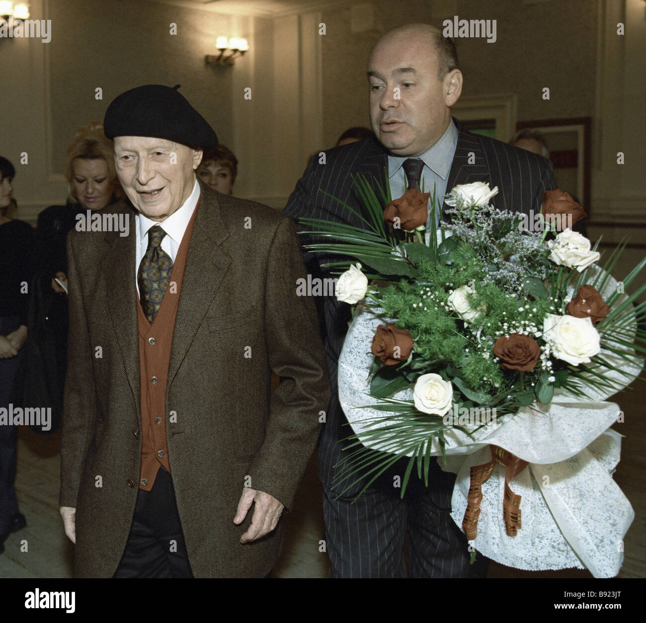 Russian Culture Minister Mikhail Shvydkoi right congratulates Igor ...