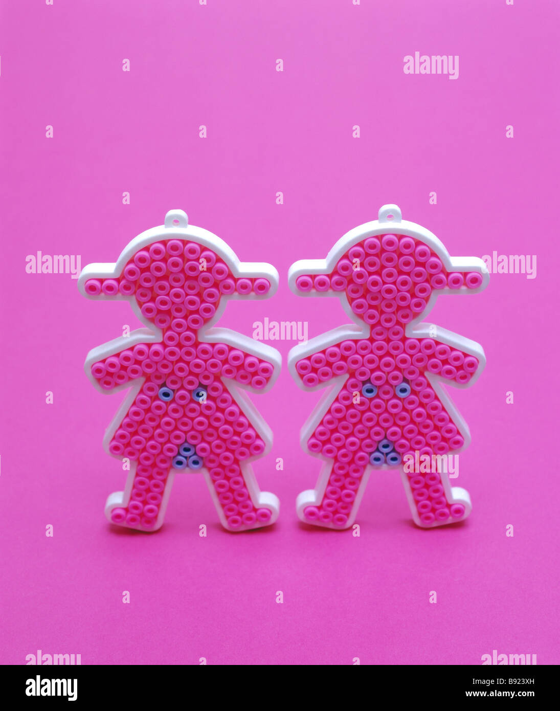 Two female figures in pink Sweden Stock Photo - Alamy