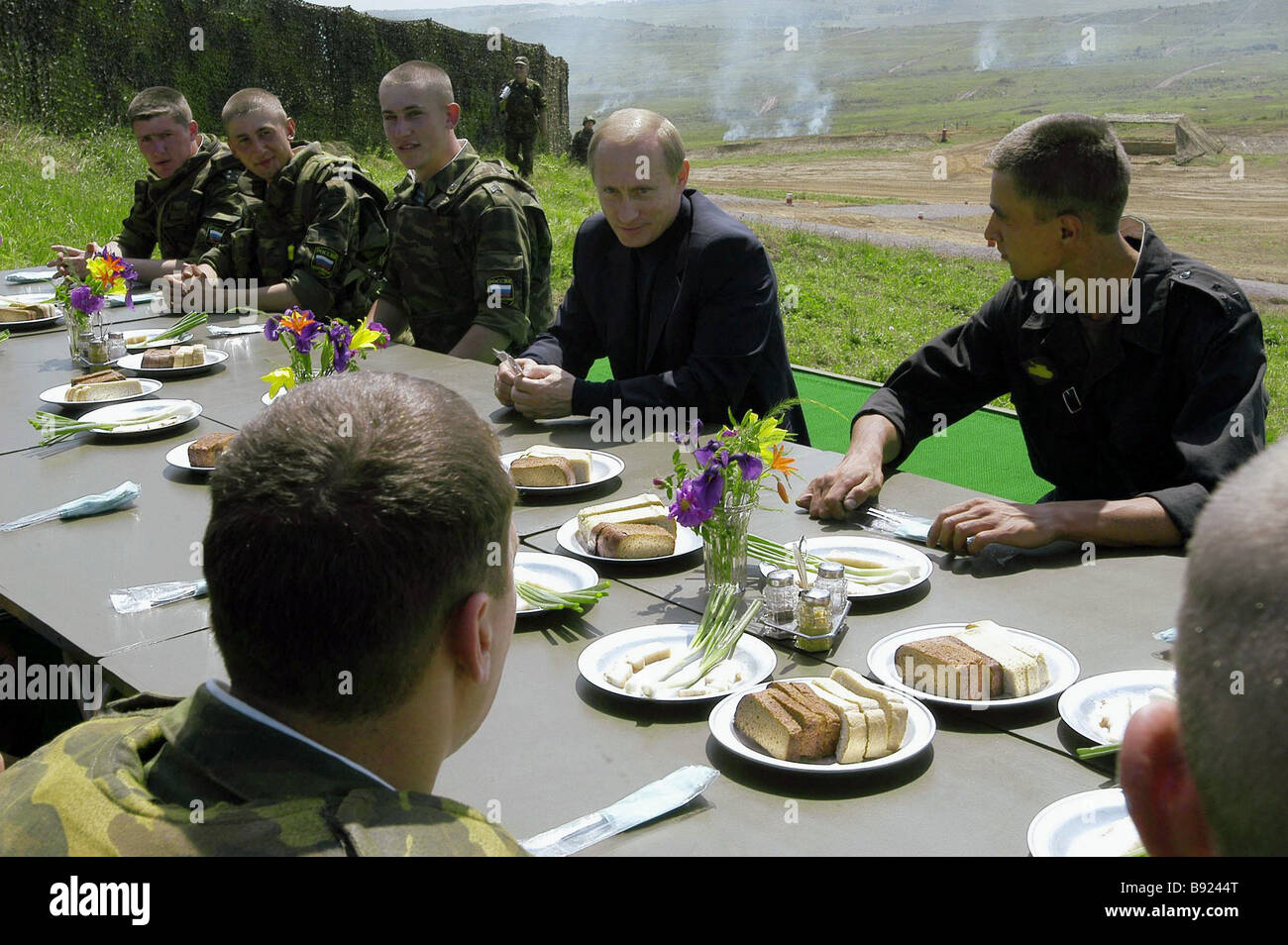 Russian President Vladimir Putin center during the Mobility 2004 ...