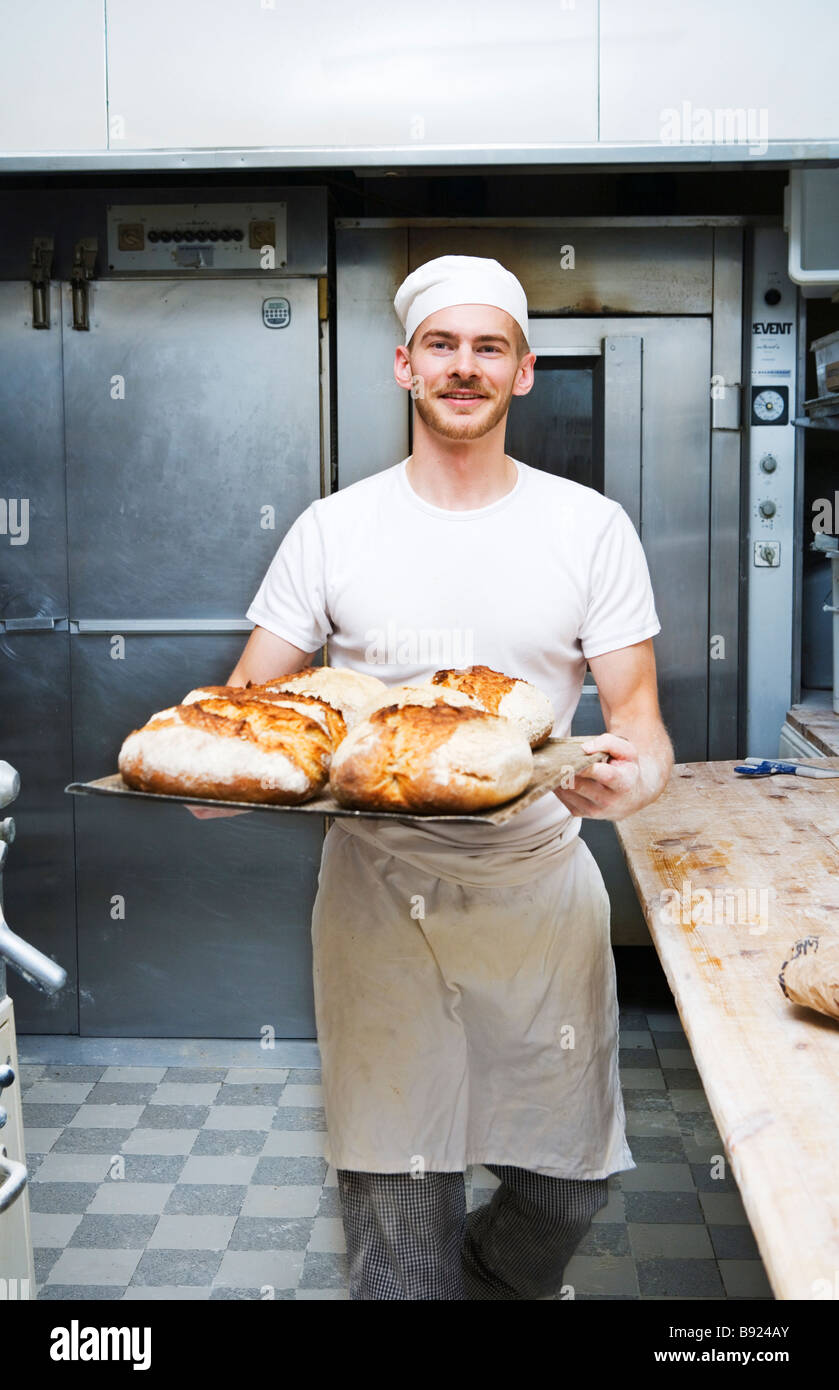 A baker in a bakery Sweden Stock Photo - Alamy