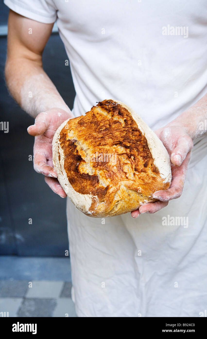 A baker in a bakery Sweden Stock Photo - Alamy