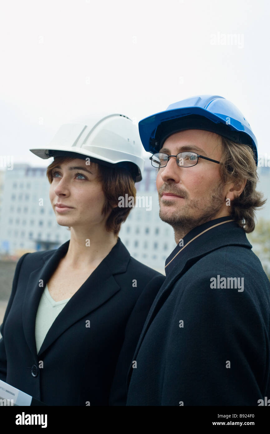 Project leaders at a building site a man and a woman Sweden Stock Photo ...