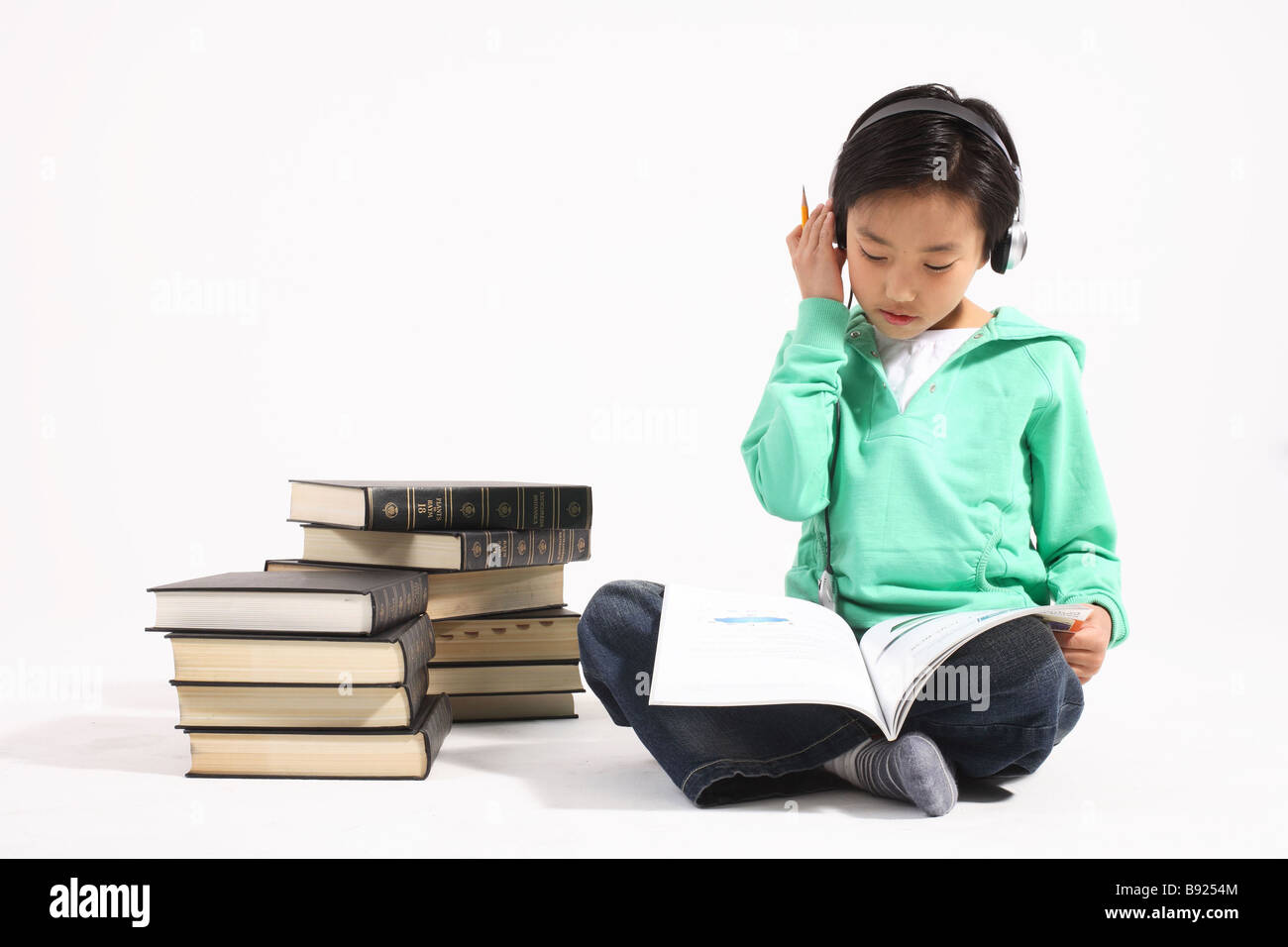 Young Child in Study Stock Photo - Alamy
