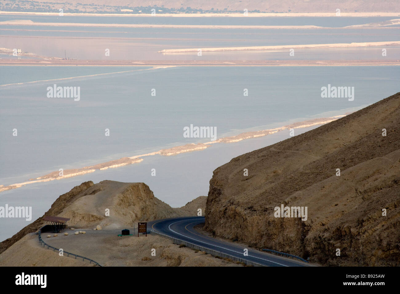Landscape view of hillside road and salt deposits in Dead Sea, Israel ...