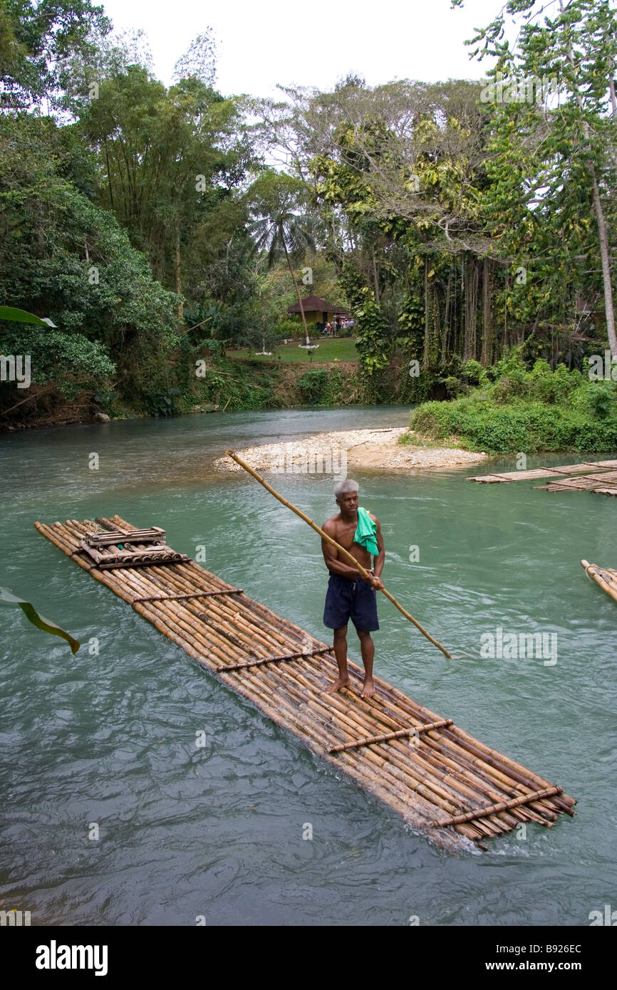 Jamaican river raft and captian Stock Photo - Alamy