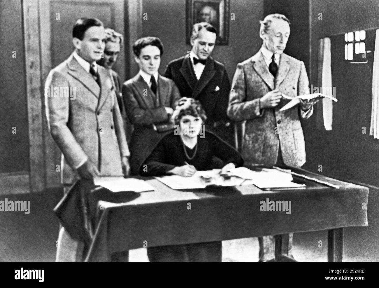 American actor and director Charlie Chaplin second from left his ...