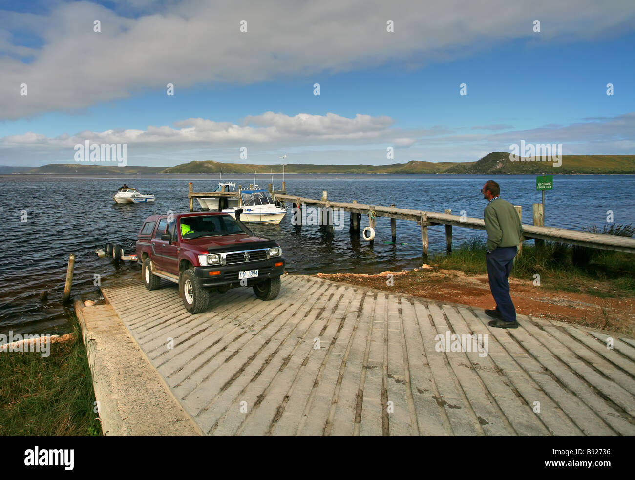 Boat Ramp trailer 4WD loading Stock Photo - Alamy