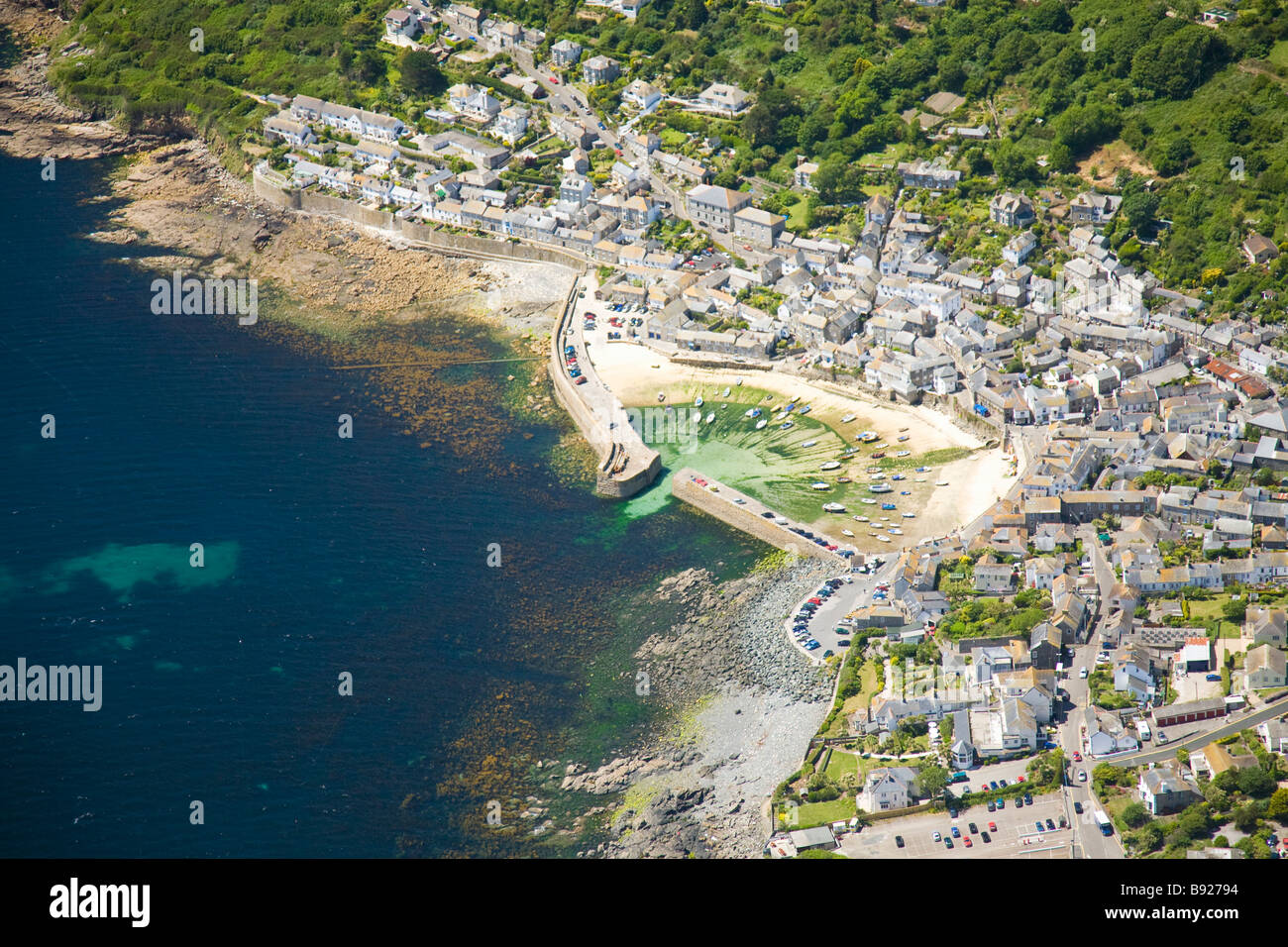 Aerial view of Mousehole harbour in summer sun Cornwall England UK ...