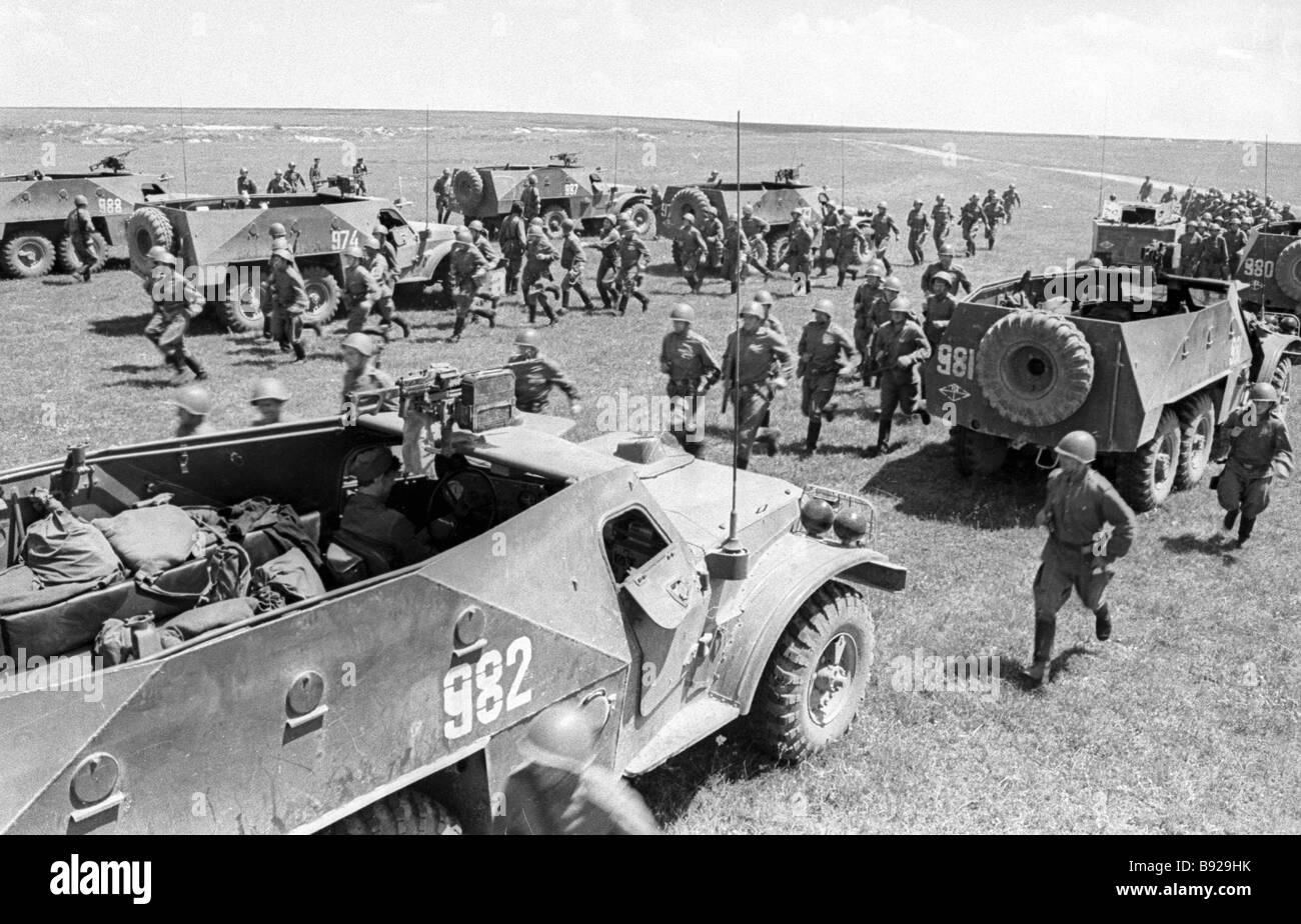 Motorized rifle soldiers and armored personnel carriers during the ...