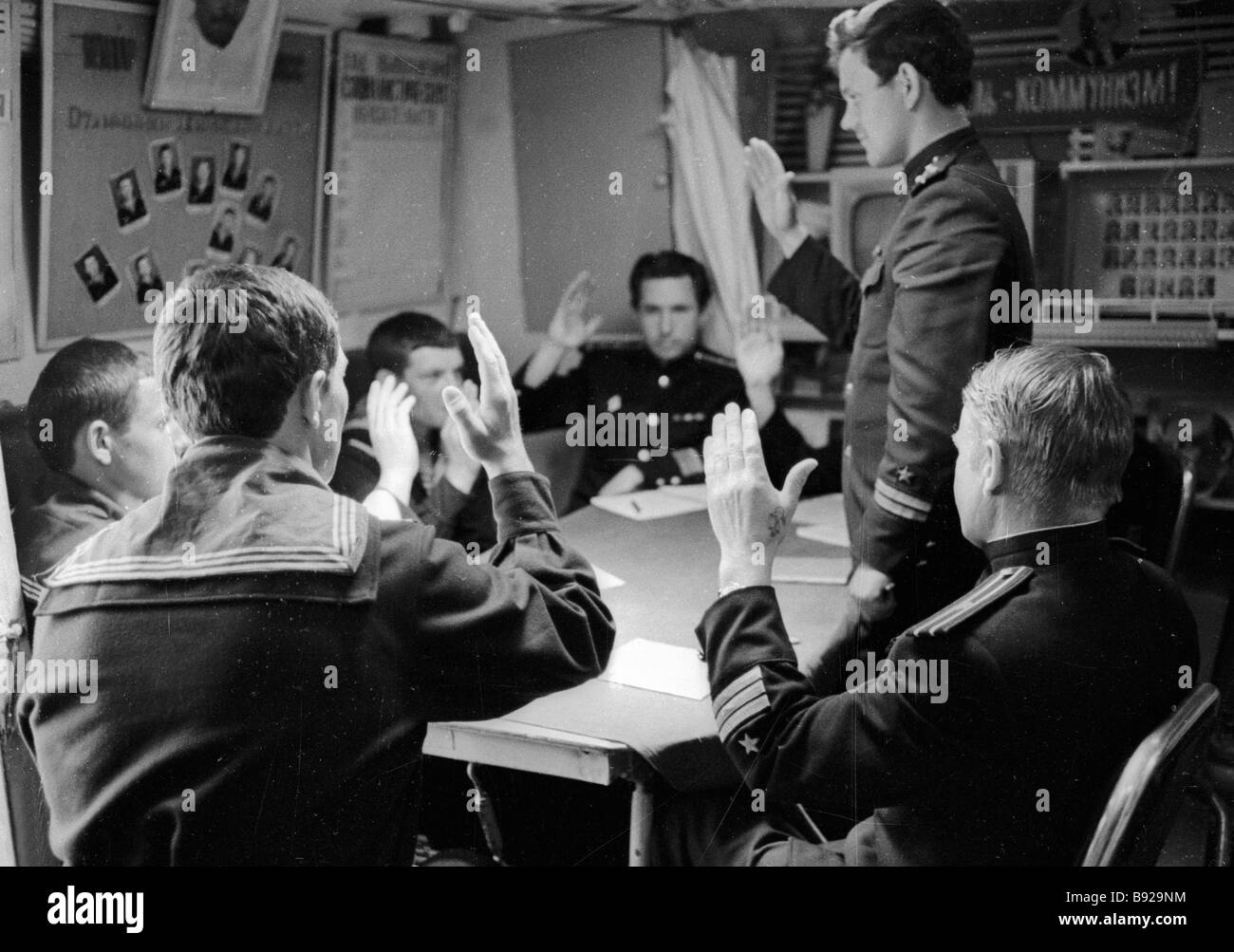 Ship officers voting at a meeting Stock Photo - Alamy