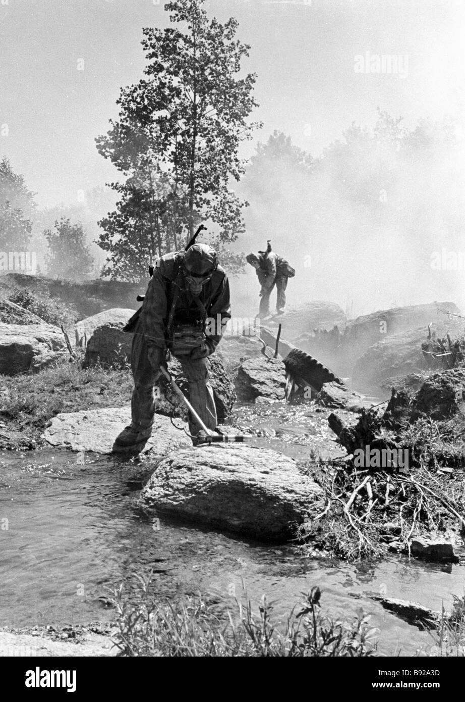Combat engineers measuring background radiation Stock Photo - Alamy