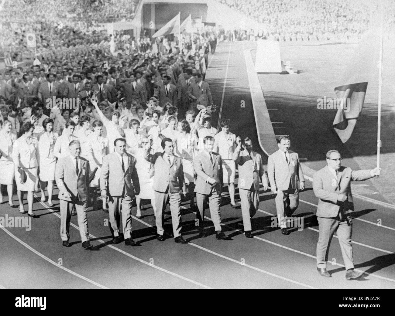 Soviet Olympic team marches by during opening ceremony of the 18th ...