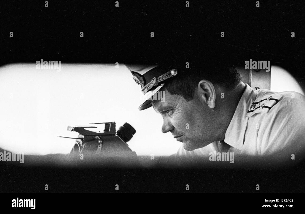 Commander of Dzerzhinsky cruiser Captain rank I Yuri Ulanov sets the ...