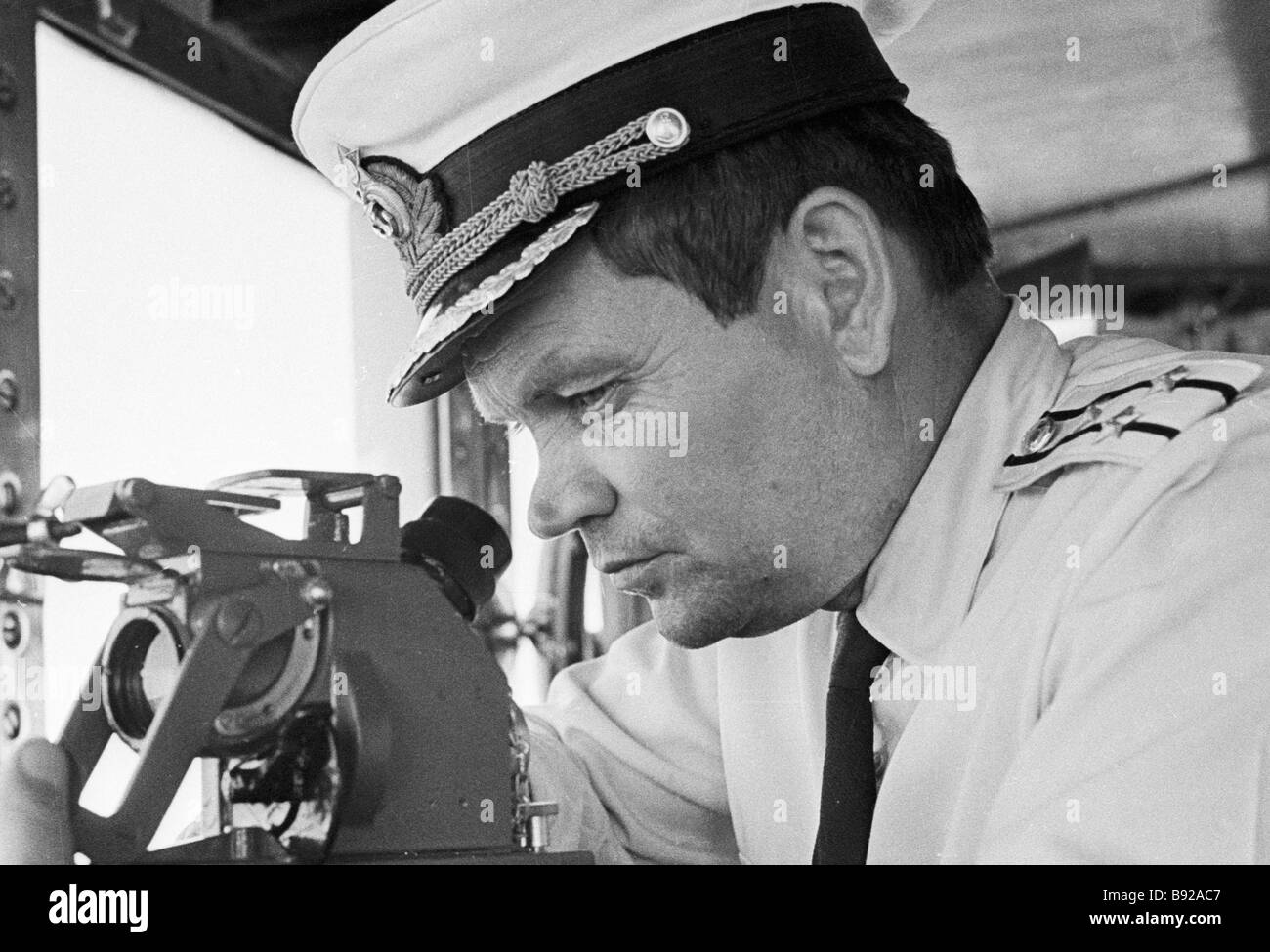 Commander of Dzerzhinsky cruiser Captain rank I Yuri Ulanov sets the ...