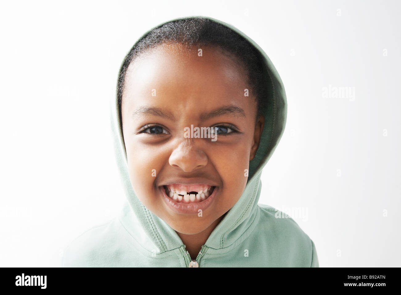 Young girl showing missing tooth Stock Photo - Alamy