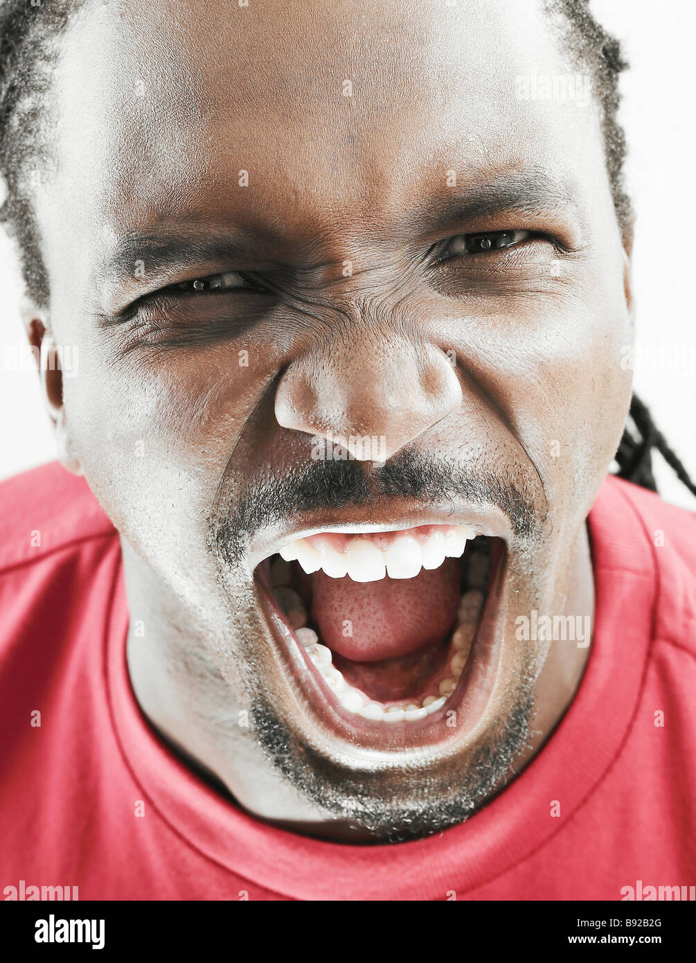 Close up of man shouting with mouth open Stock Photo - Alamy