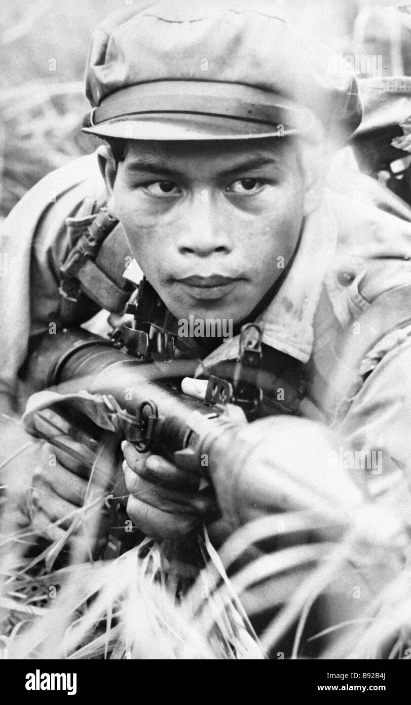 A soldier of the People s Liberation Army of Laos Stock Photo - Alamy
