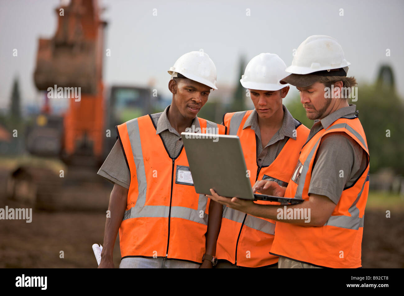 Workers on laptop at construction site Johannesburg Gauteng Province ...