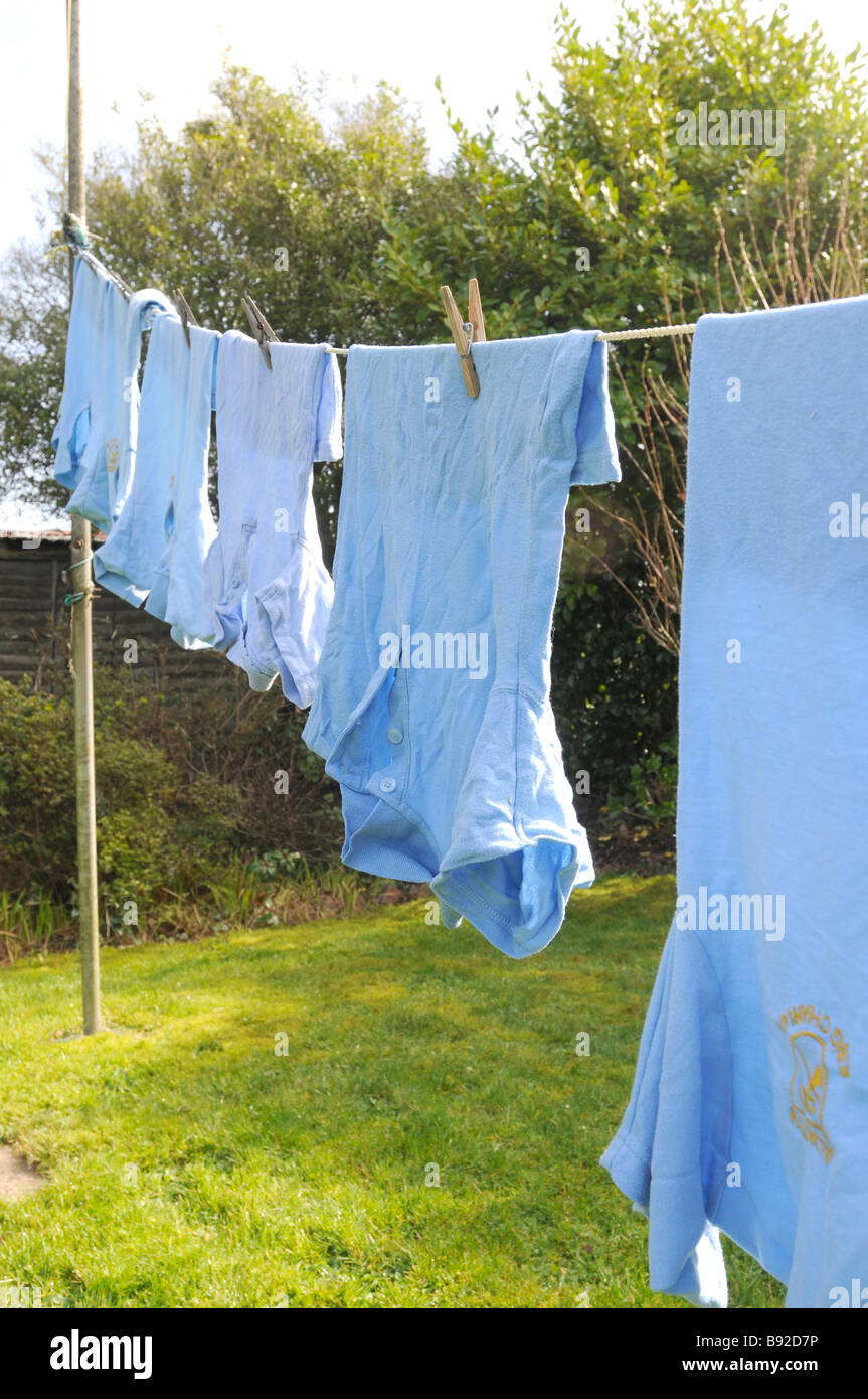 School uniforms drying on a washing line Stock Photo - Alamy