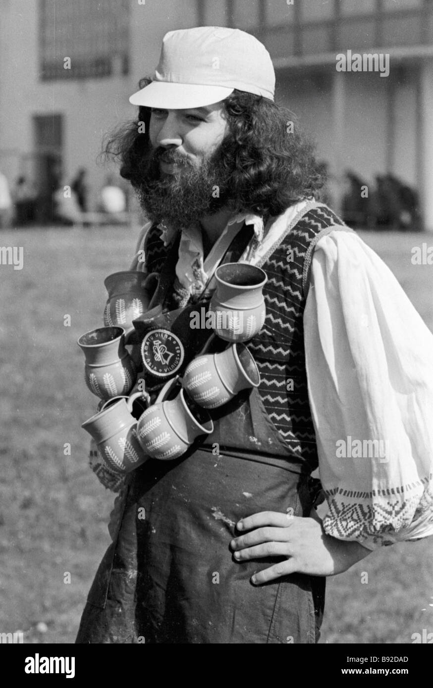 A pot maker demonstrates his works at the Crafts festival Stock Photo ...