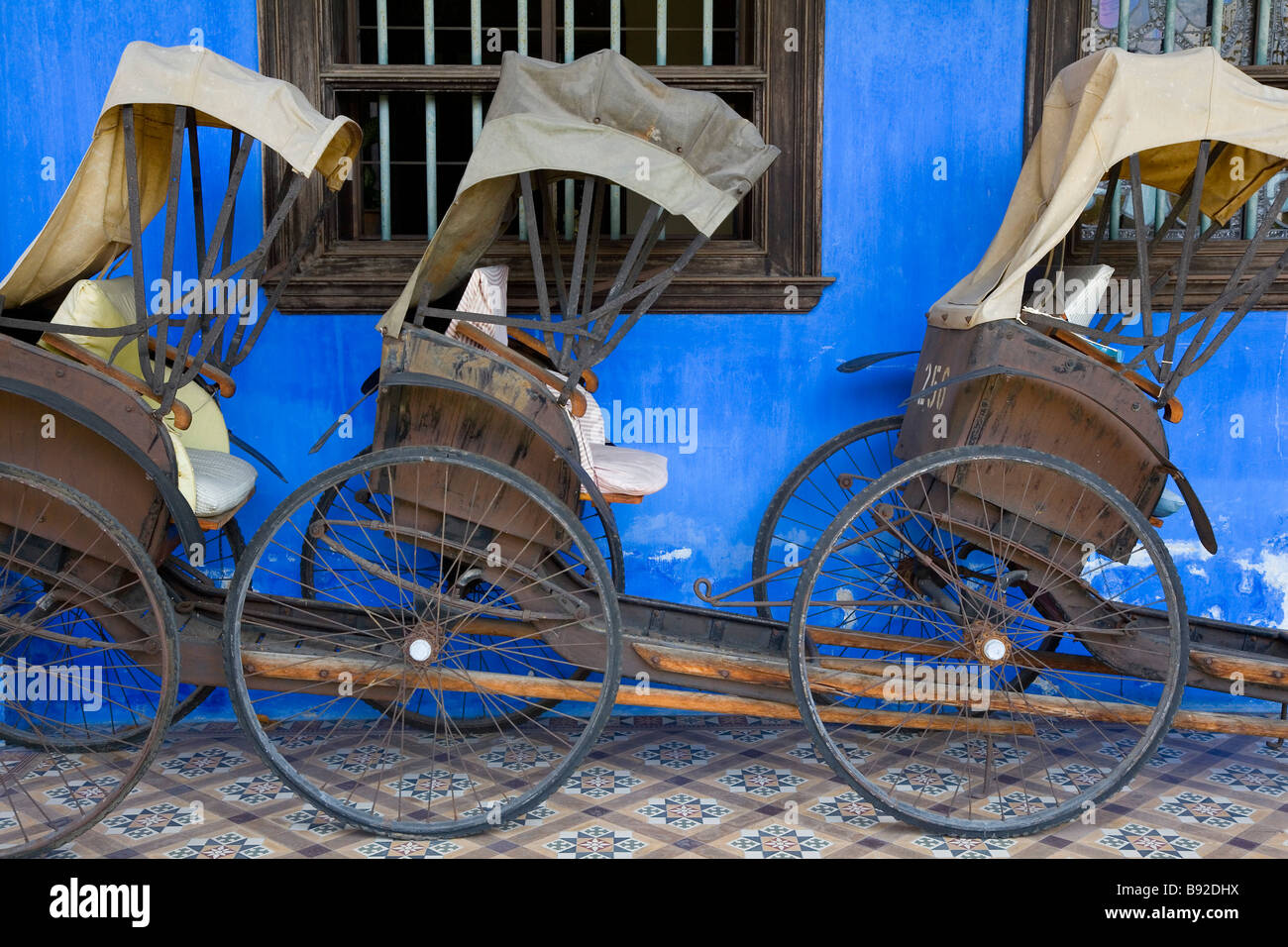 Old rickshaws & house front Georgetown, Penang, Malaysia Stock Photo ...
