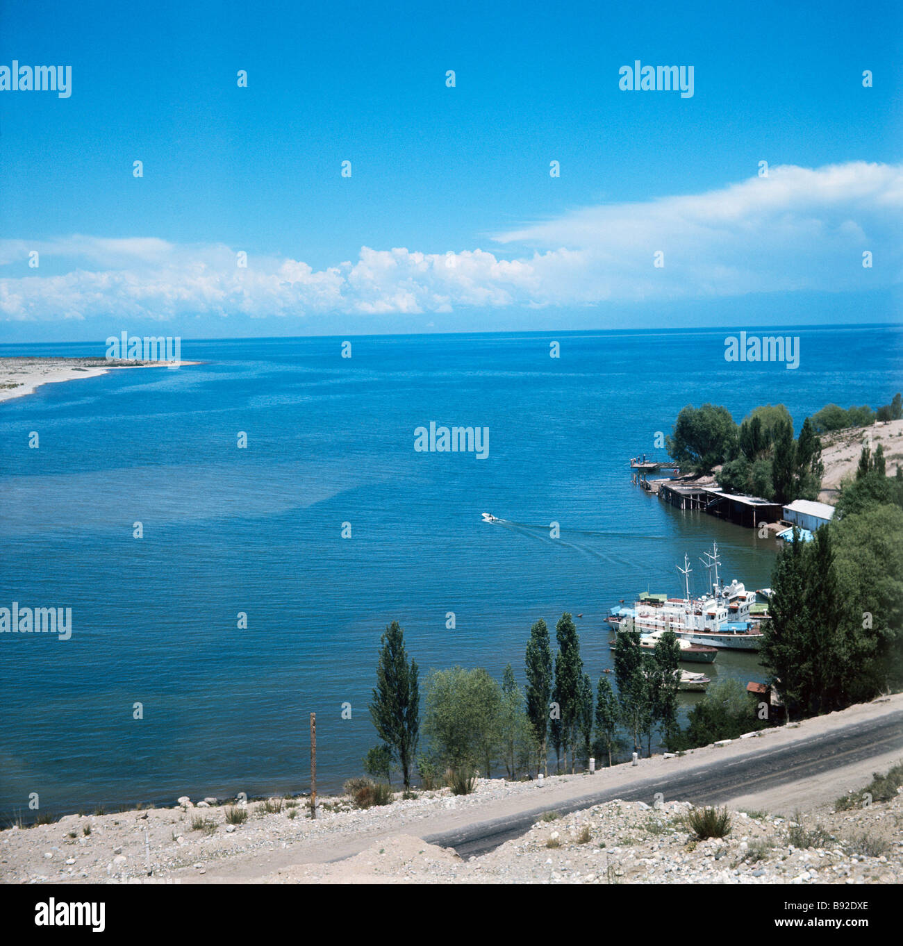 View of Lake Issyk Kul in Kyrgyzstan from Tamga resort Stock Photo - Alamy