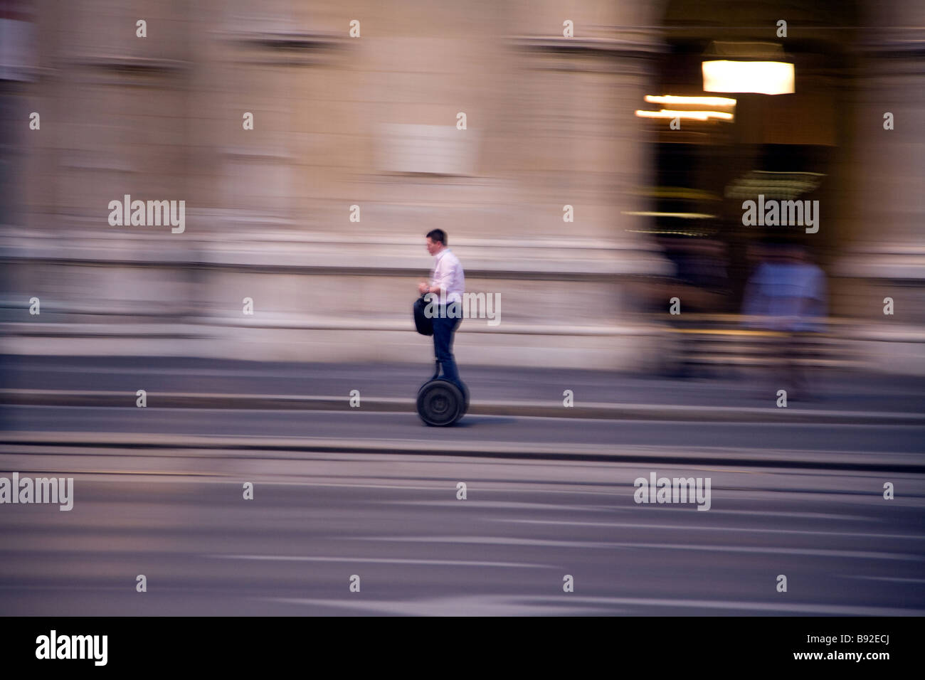 Man riding Segway along a street in Vienna Austria Stock Photo - Alamy